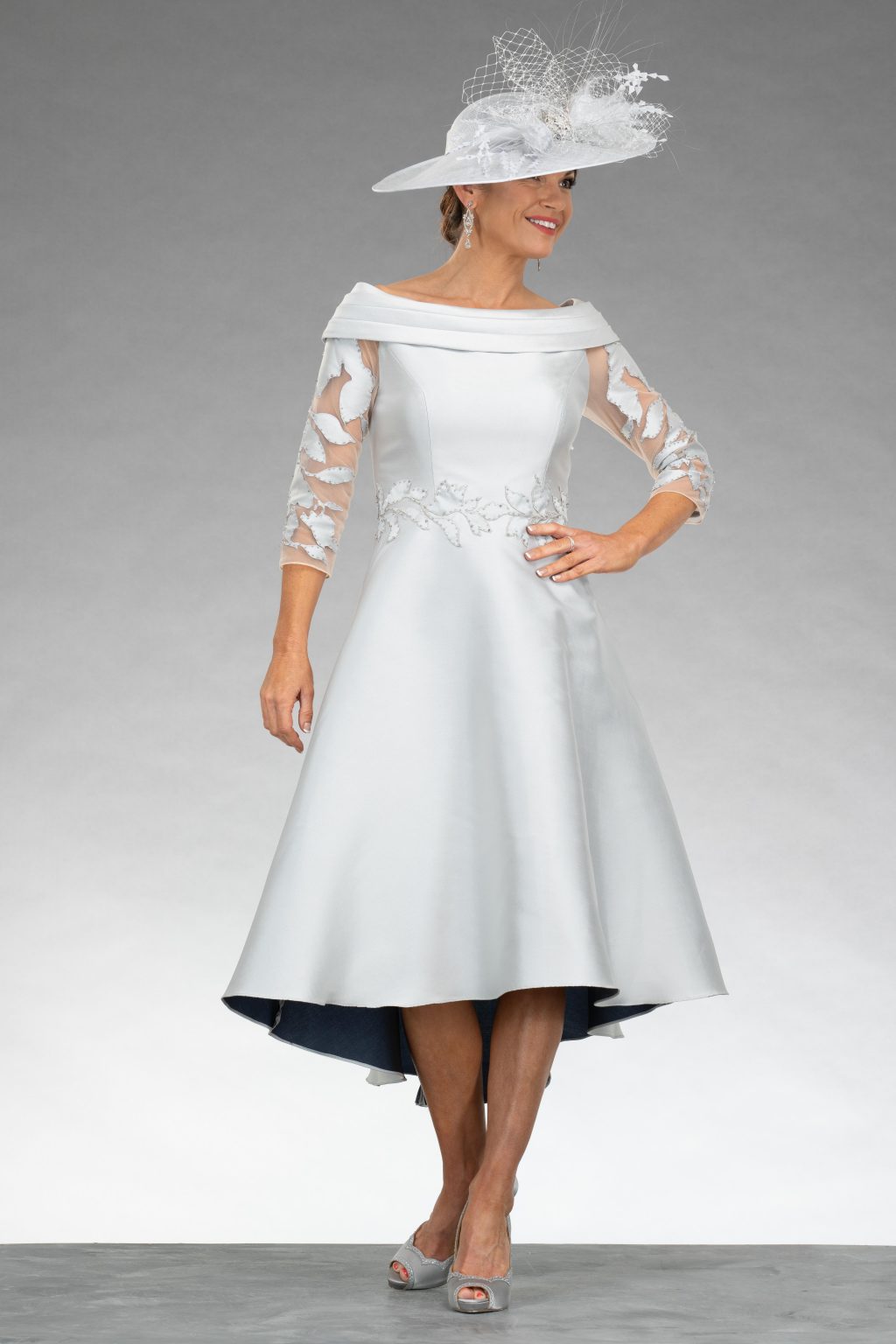 Dipped hem dress with sleeves. IR4917S - Catherines of Partick Dipped hem dress with sleeves. IR4917S - Catherines of Partick